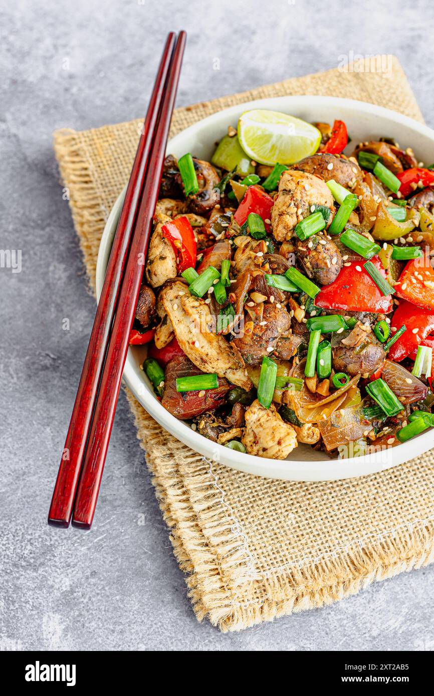 Chicken Mushroom Stir-Fried in a Bowl with Chopsticks Vertical Top Down ...