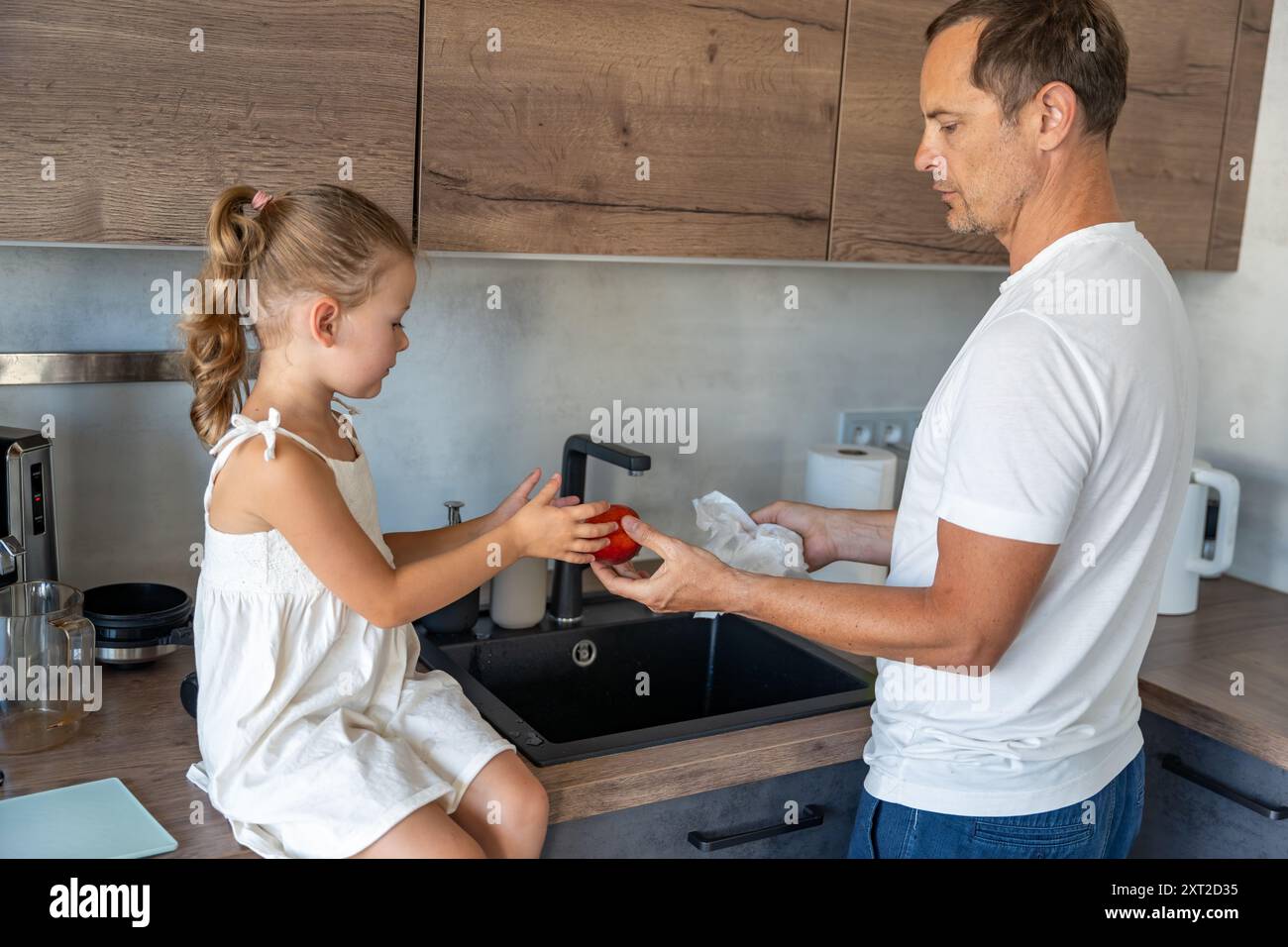 A Father and Daughter Enjoy Quality Time Cooking Together, Bonding Over ...
