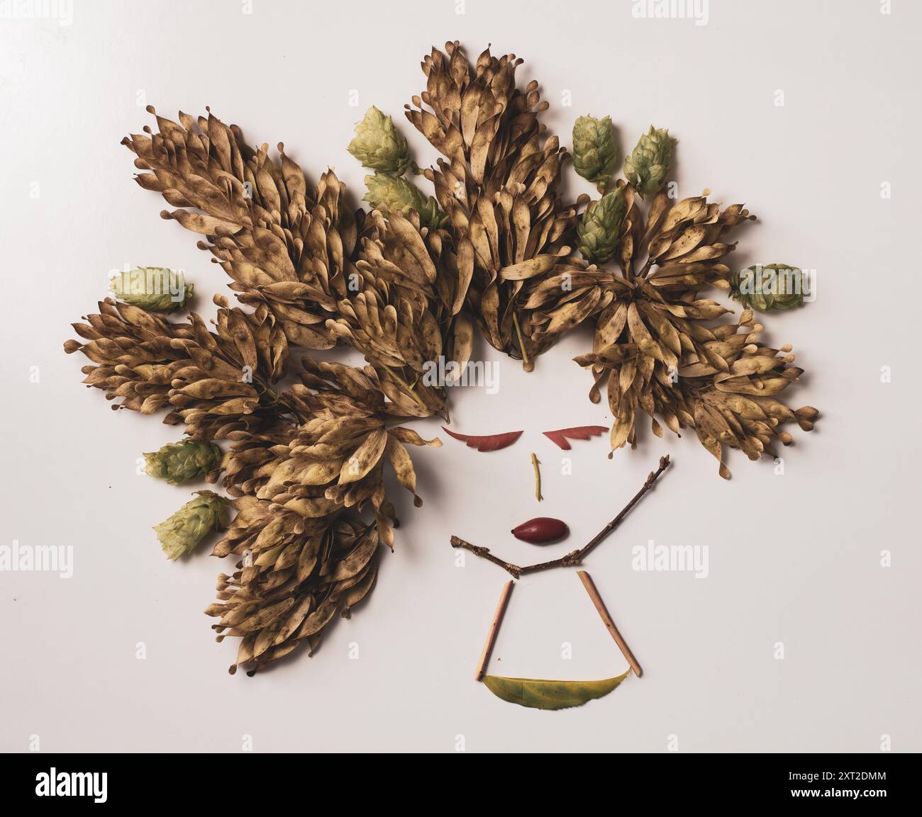 colorful woman face with huge hair made from vivid leaves, creativity ...