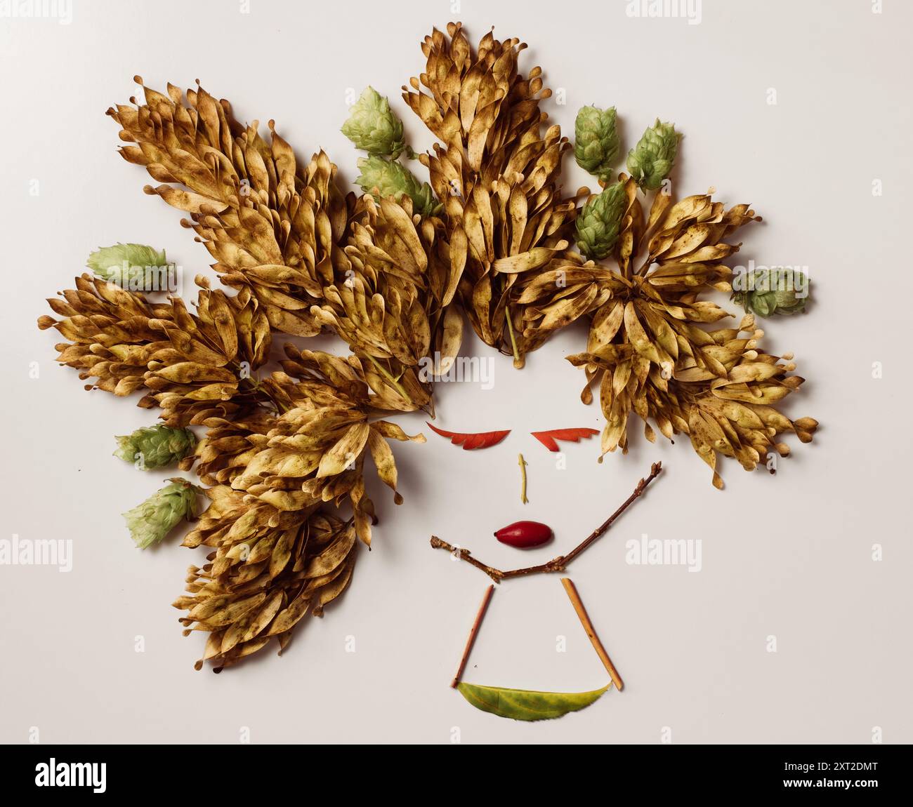 colorful woman face with huge hair made from vivid leaves, creativity ...