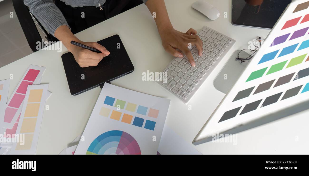 Creative Graphic Designer Working on Color Palettes and Digital Designs ...