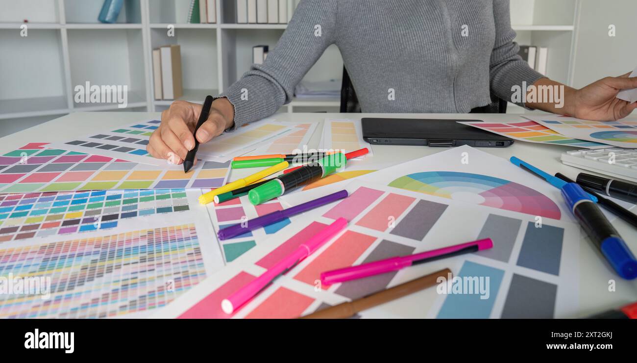 Creative Graphic Designer Working with Color Swatches and Design Tools ...