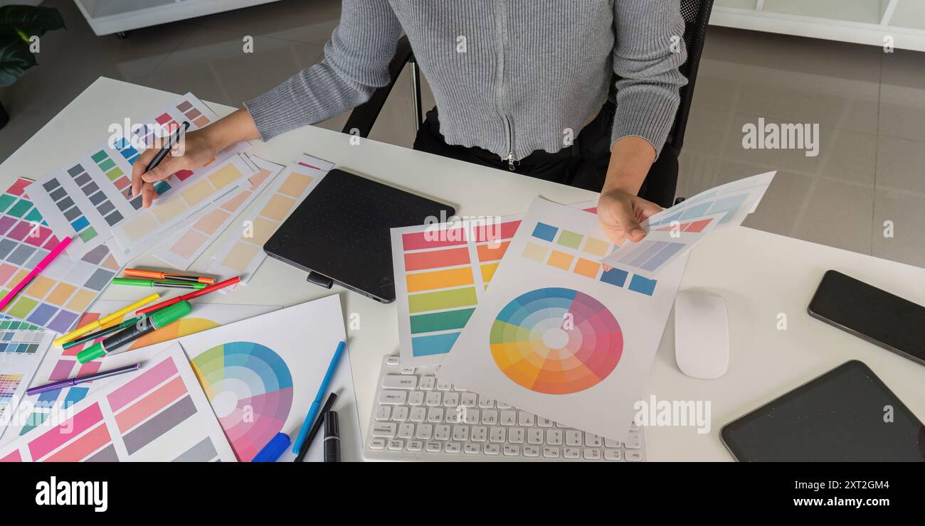 Creative Graphic Designer Working on Color Palettes and Design Concepts ...
