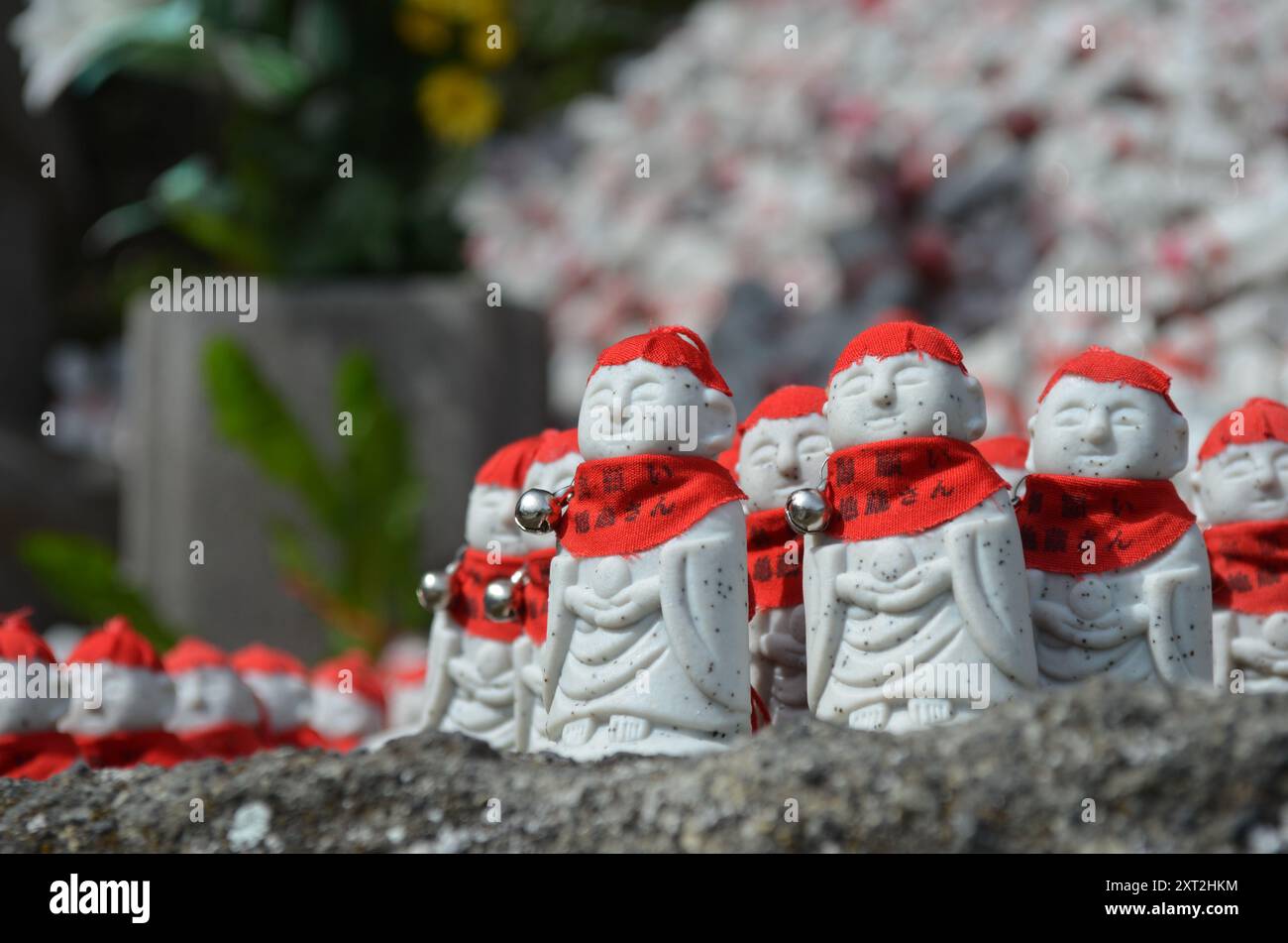 Tiny Jizo statues at a buddhist shrine Stock Photo - Alamy