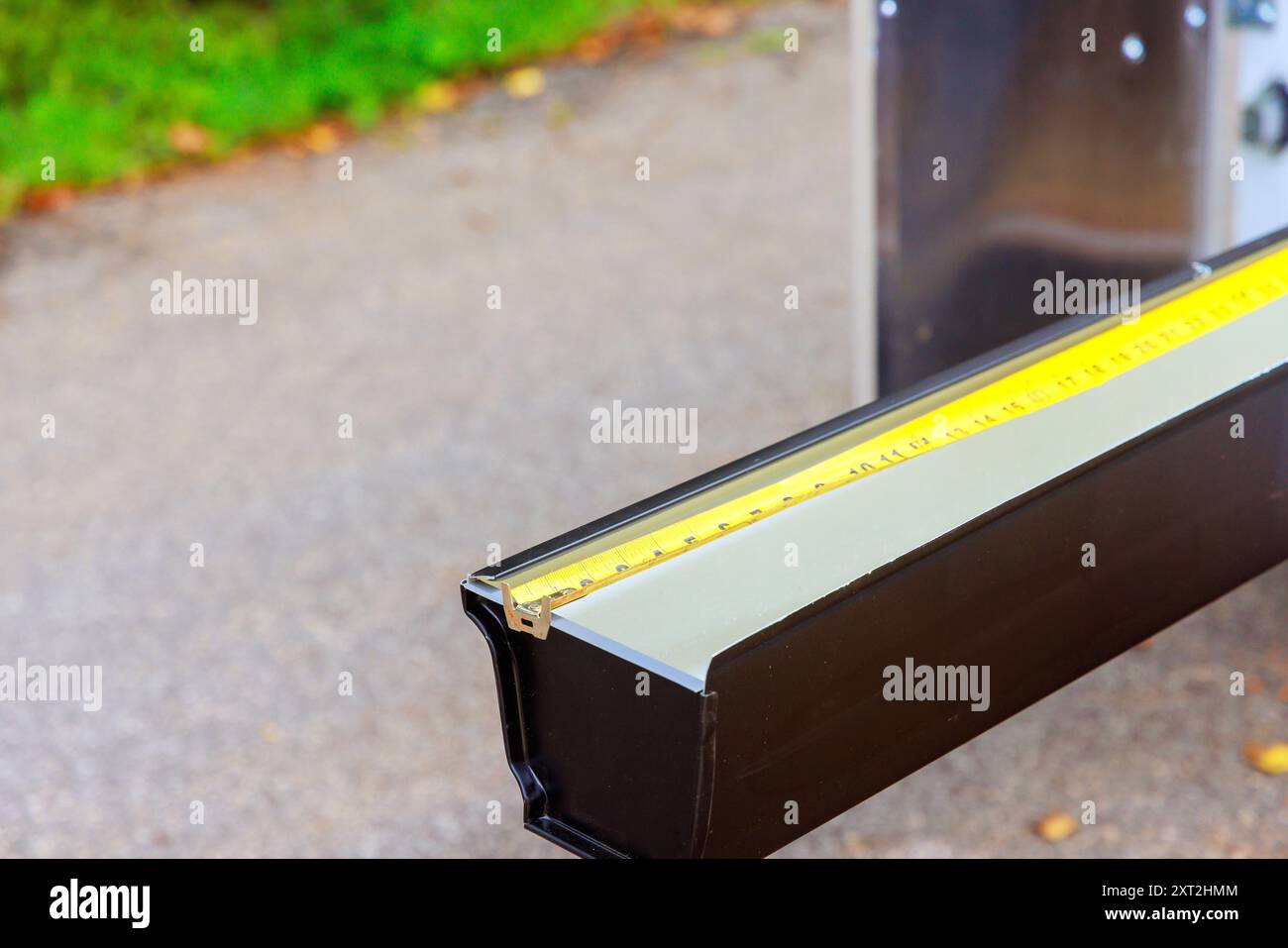 Using bending machine tool, rain gutters are bent from thin metal Stock ...