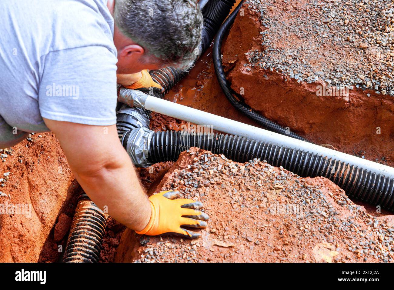 Trench underground is prepared for laying assembling drainage pipes for ...
