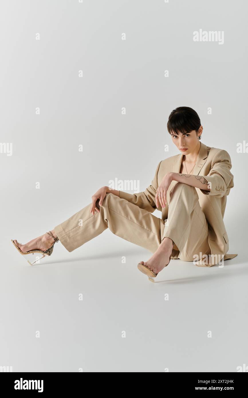 Beautiful legs crossed and heels hi-res stock photography and images ...