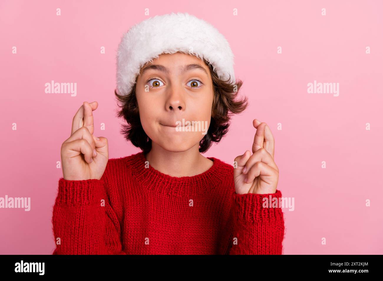 Photo of kid boy cross fingers pleading on christmas eve isolated ...