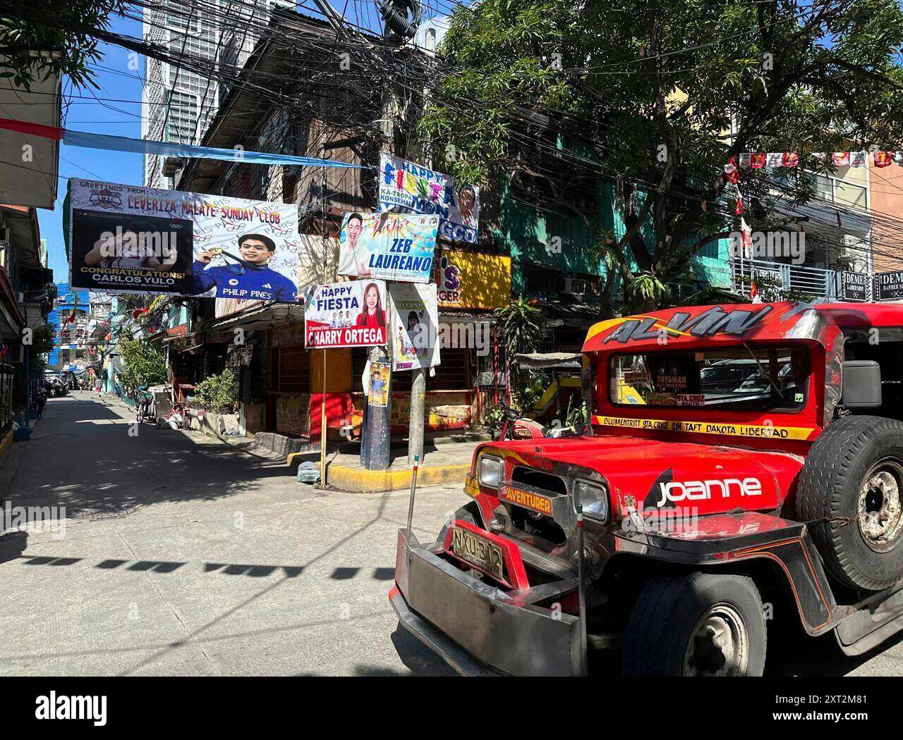 A banner congratulating Filipino gymnast Carlo Yulo, who won two gold ...
