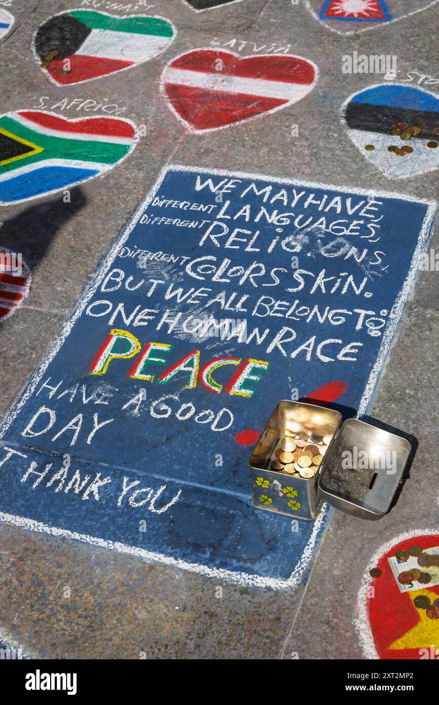painting of a pavement painter in front of the cathedral, flags of ...