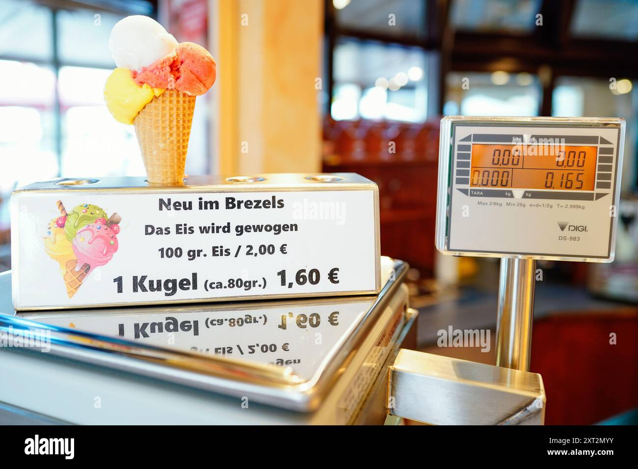 Gaggenau, Germany. 13th Aug, 2024. An ice cream in a cone stands on a ...