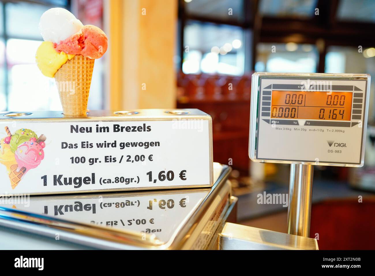 Gaggenau, Germany. 13th Aug, 2024. An ice cream in a cone stands on a ...