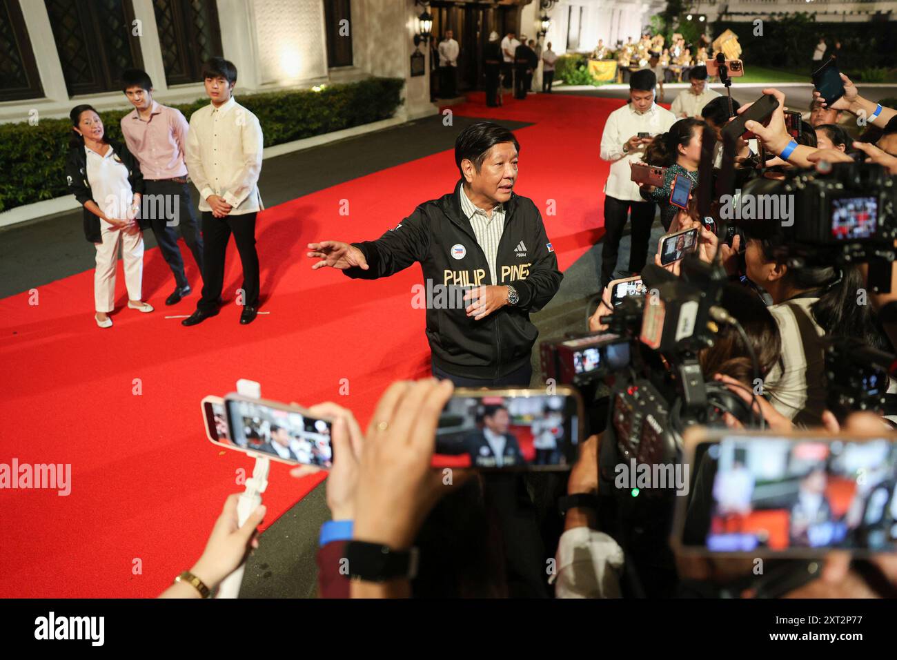 President Ferdinand Marcos Jr., center, gestures as he speaks to the ...