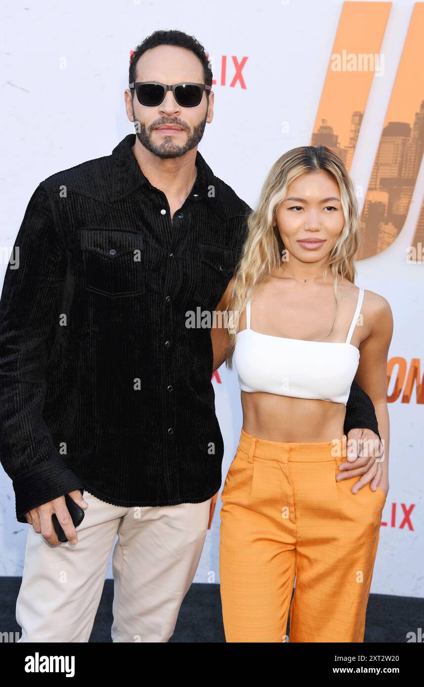 LOS ANGELES, CALIFORNIA - AUGUST 12: (L-R) Daniel Sunjata and Pwinty ...