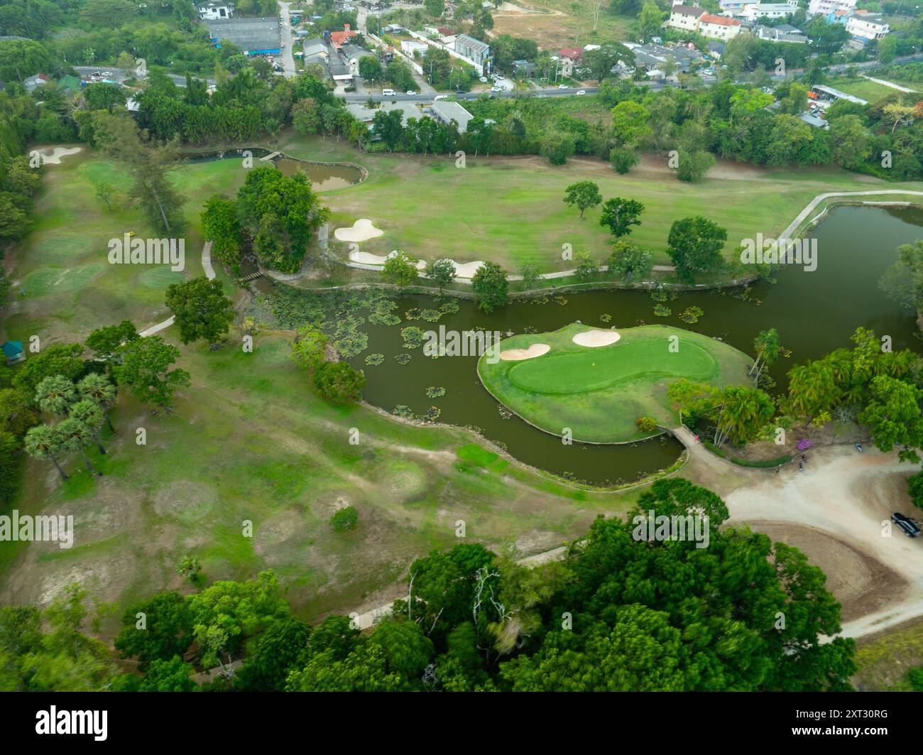 Aerial view drone shot of beautiful green golf field at Phuket island ...
