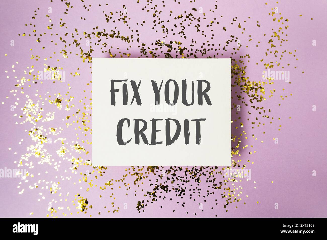 A white sign with the words Fix Your Credit written on it. The sign is ...