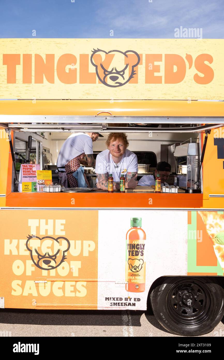 EDITORIAL USE ONLY Ed Sheeran surprises Sainsbury's supermarket ...