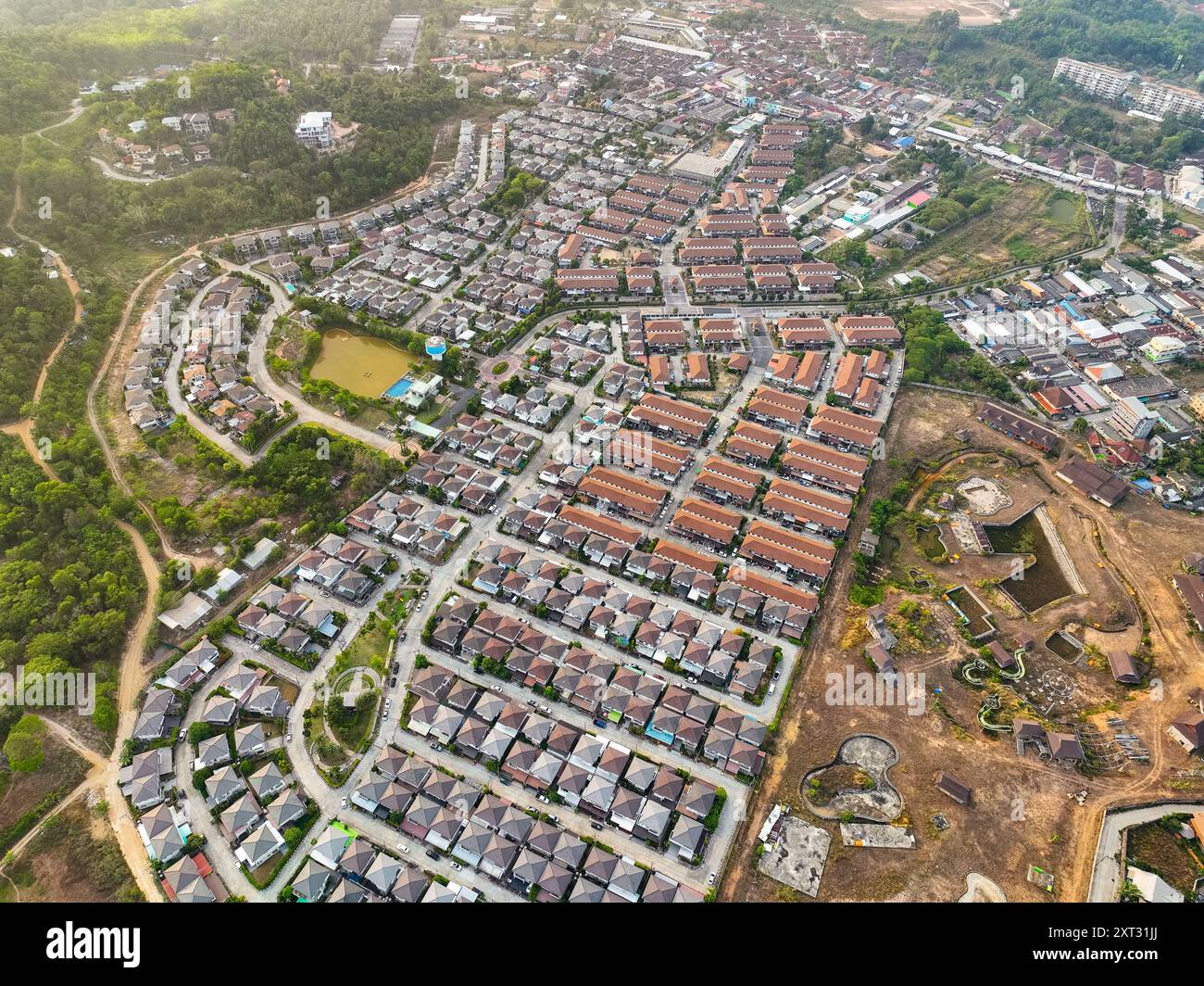 Aerial view of residential houses and driveways neighborhood during a ...