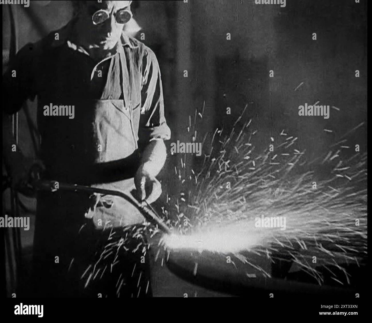 Man Working in a Factory, 1933. 'In Hitler's new Germany, organisation ...