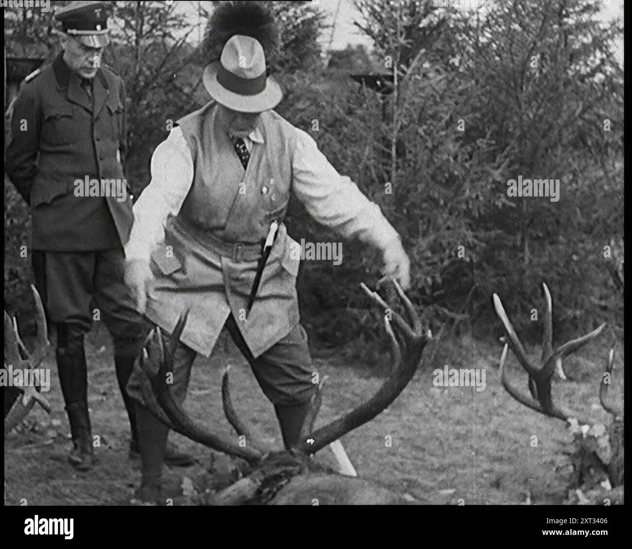 Nazi Officer Hermann Goering in Hunting Dress Showing His Colleagues a ...