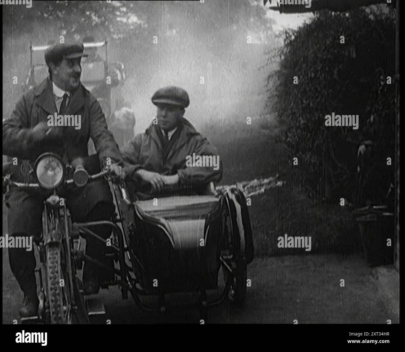A Motorcycle and Sidecar Pulling up at a Petrol Station for a ...