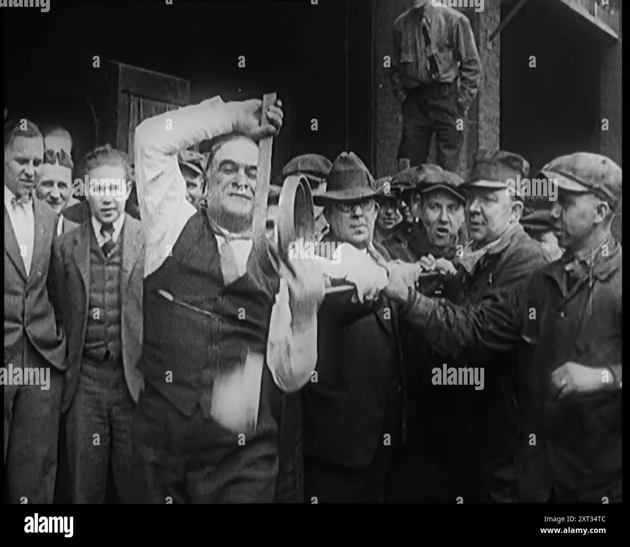 A Male Stuntman Bending Iron Bars Around His Head, 1926. From "Time To Remember 1926 - Short ...