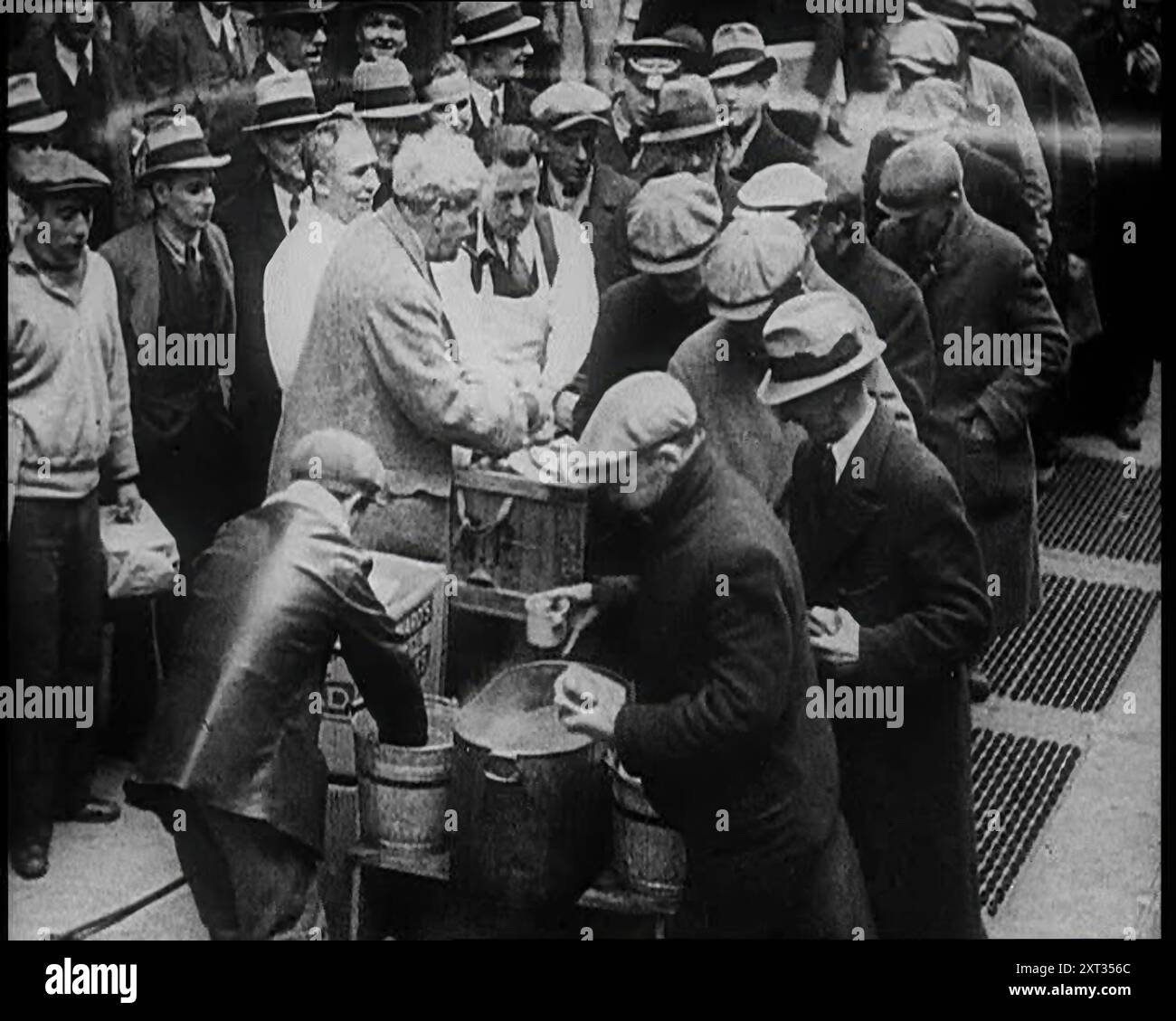 Men Getting Soup from a Soup Kitchen, 1933. '...all nations, rich and ...
