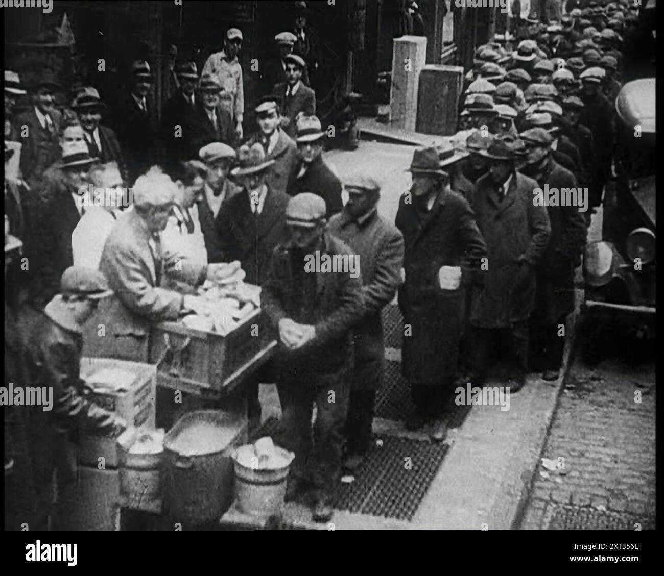 Men Getting Soup from a Soup Kitchen, 1933. '...all nations, rich and ...