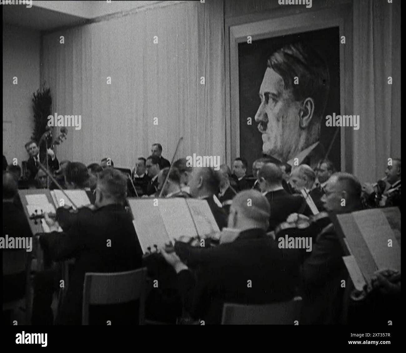 Orchestra Playing with a Portrait of Adolf Hitler in the Background ...