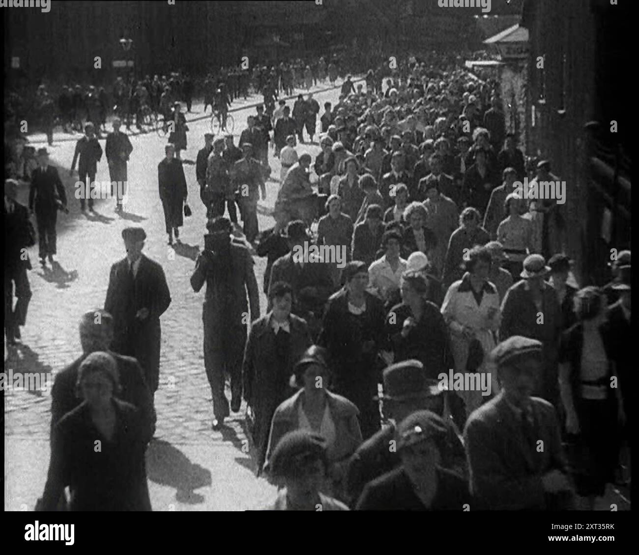 Large Crowd Walking Towards the Camera, 1933. 'In Hitler's new Germany ...