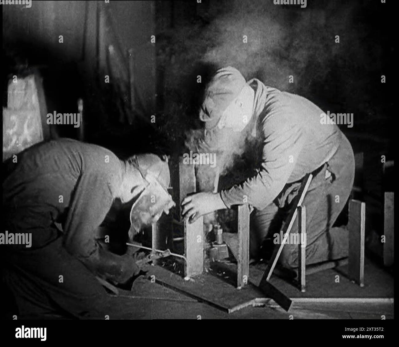 Two Men Working in a Factory, 1933. 'In Hitler's new Germany ...
