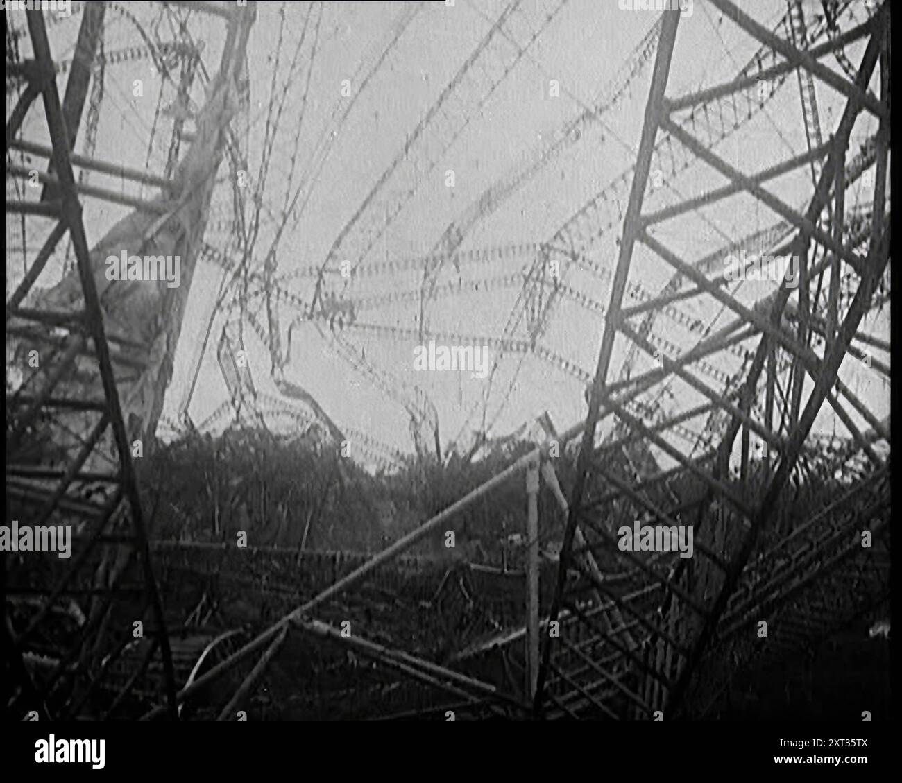 The Burnt Remains of the R-101 Airship Lying on the Ground After Fire ...