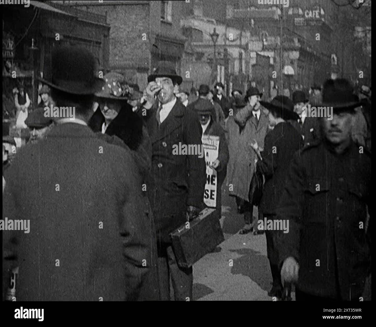 Men Wearing 'Pathe Gazette' Sandwich Boards Handing Out Pieces of ...