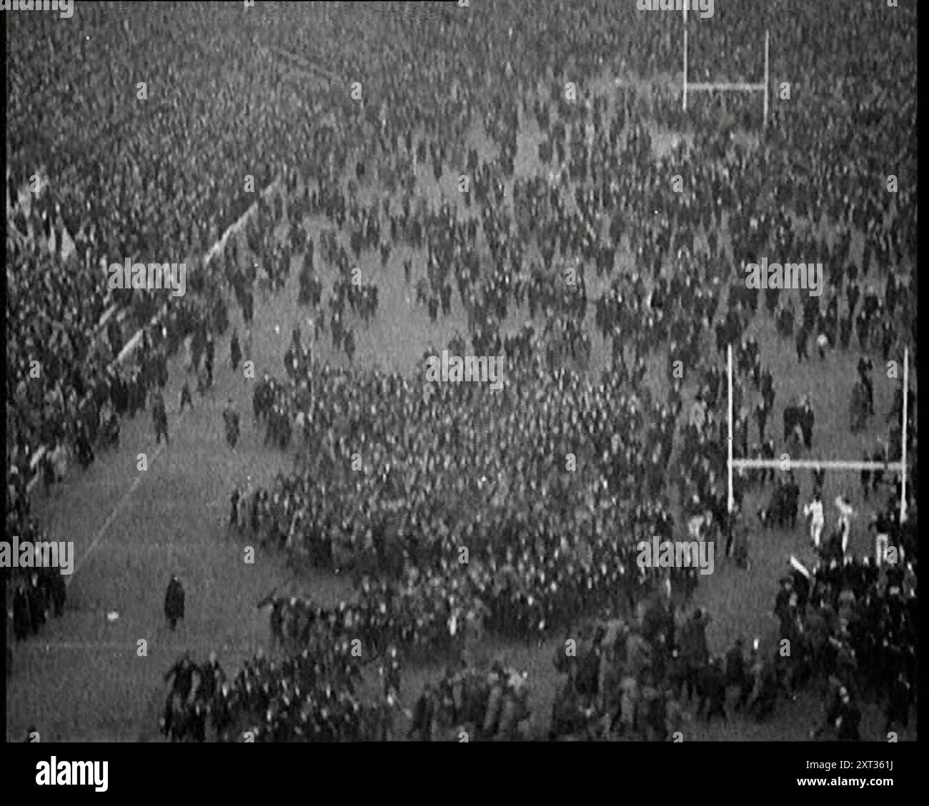 People Crowding the Pitch After an American Football Game, 1922. From ...