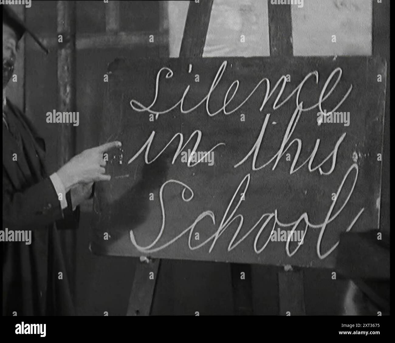 Teacher writing on blackboard schoolteacher hi-res stock photography ...