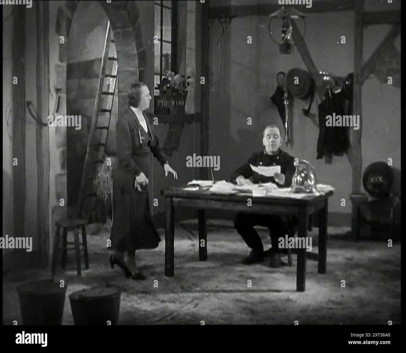 Comedian Robb Wilton On Set Playing a Fire Brigade Officer and Sitting ...