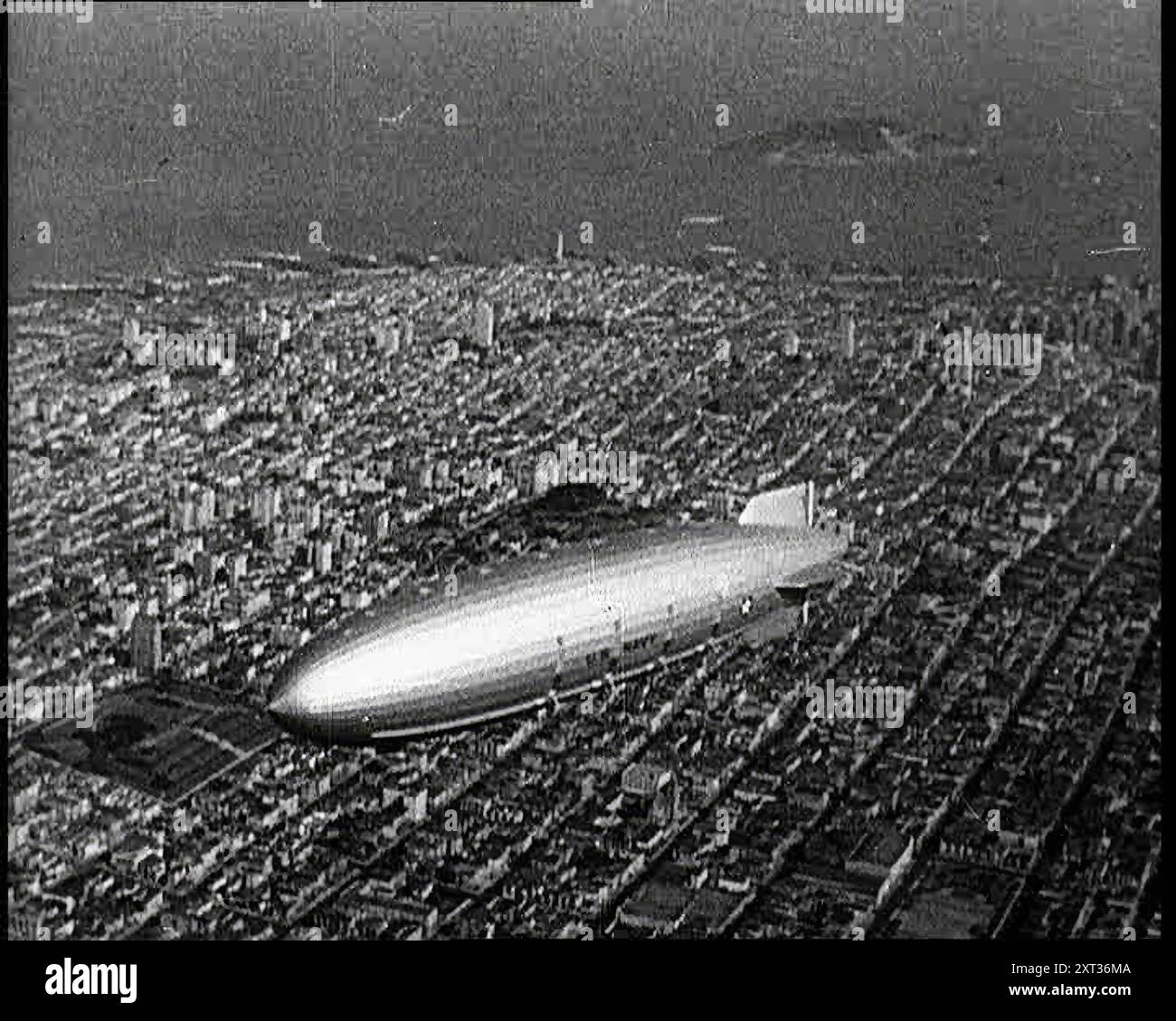 Shot of a Zeppelin Flying Over Manhattan, 1932. 'That fabulous island ...