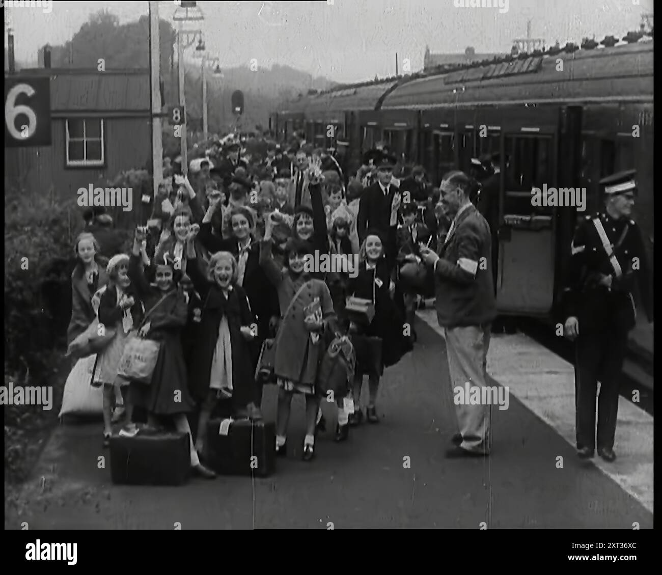 British Male and Female Evacuees on the Platform of a Small Station in ...