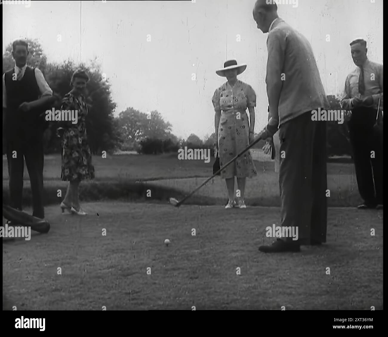 Men and Women at the Golf Links With One Man Lining up His Shot, 1939 ...