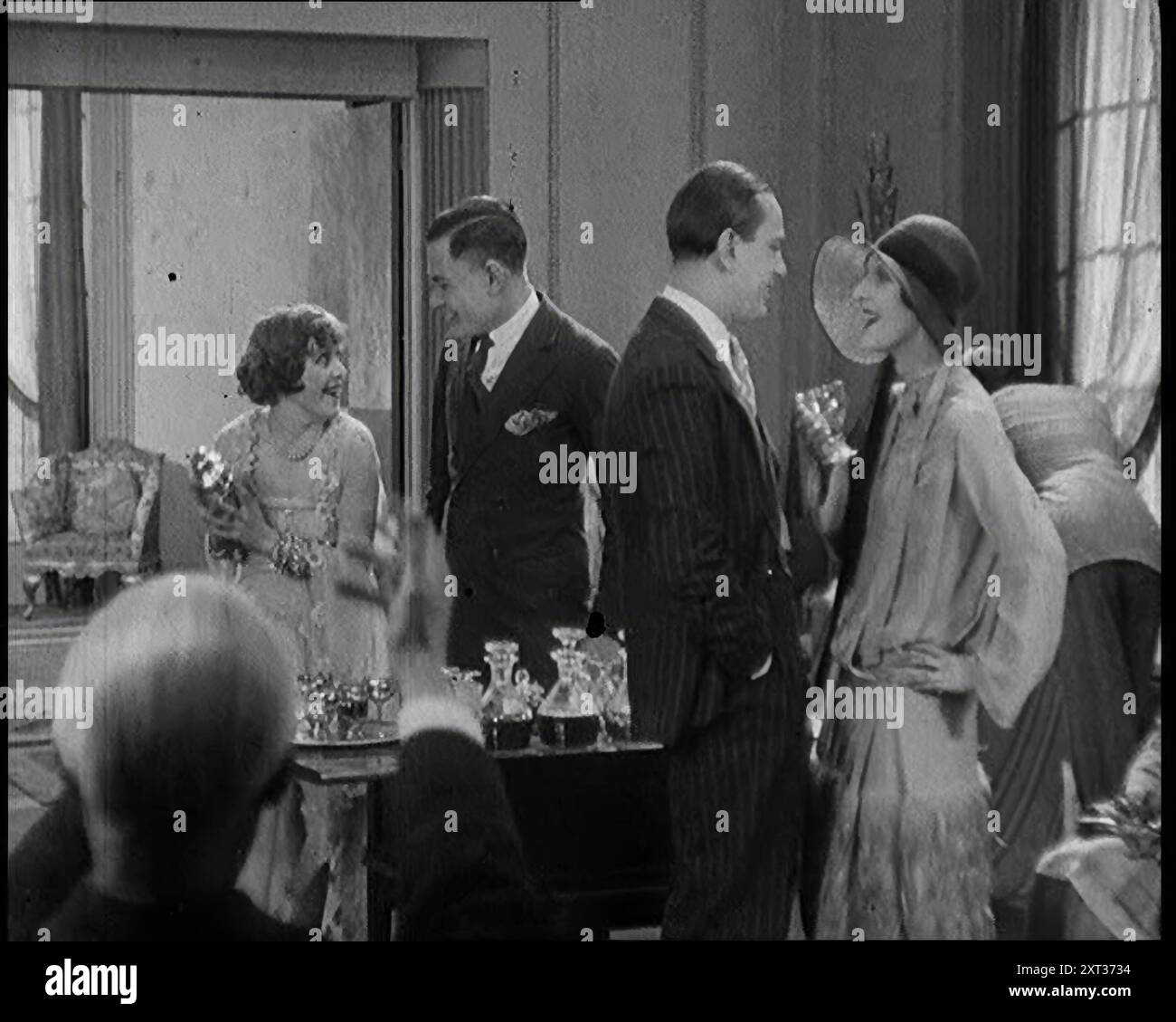 Scene from a 1920s Film. A Group of Actors Playing Bright Young Things Having a Cocktail Party ...