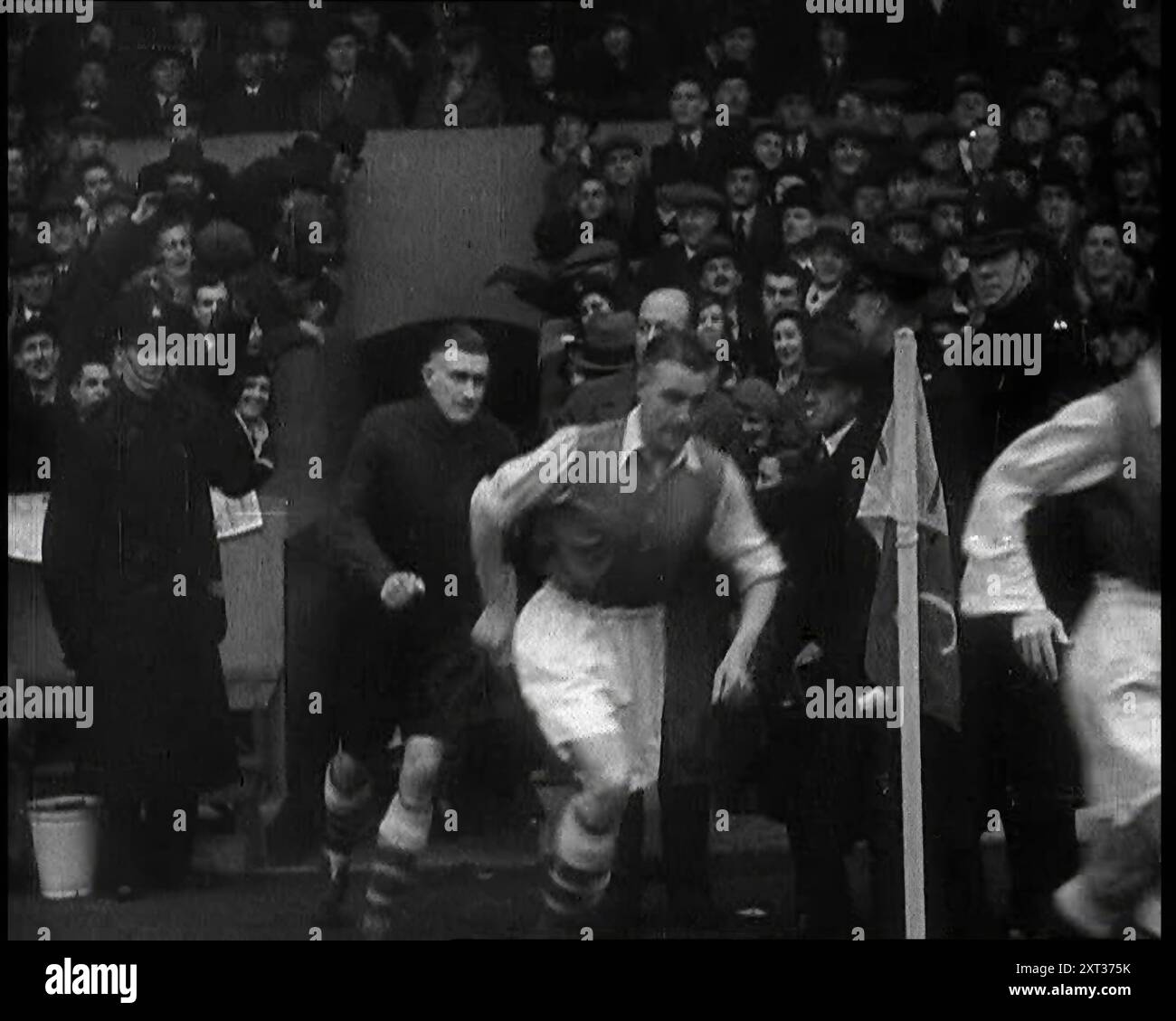 Crowds Watching Football Players Running onto the Football Pitch, 1930s ...