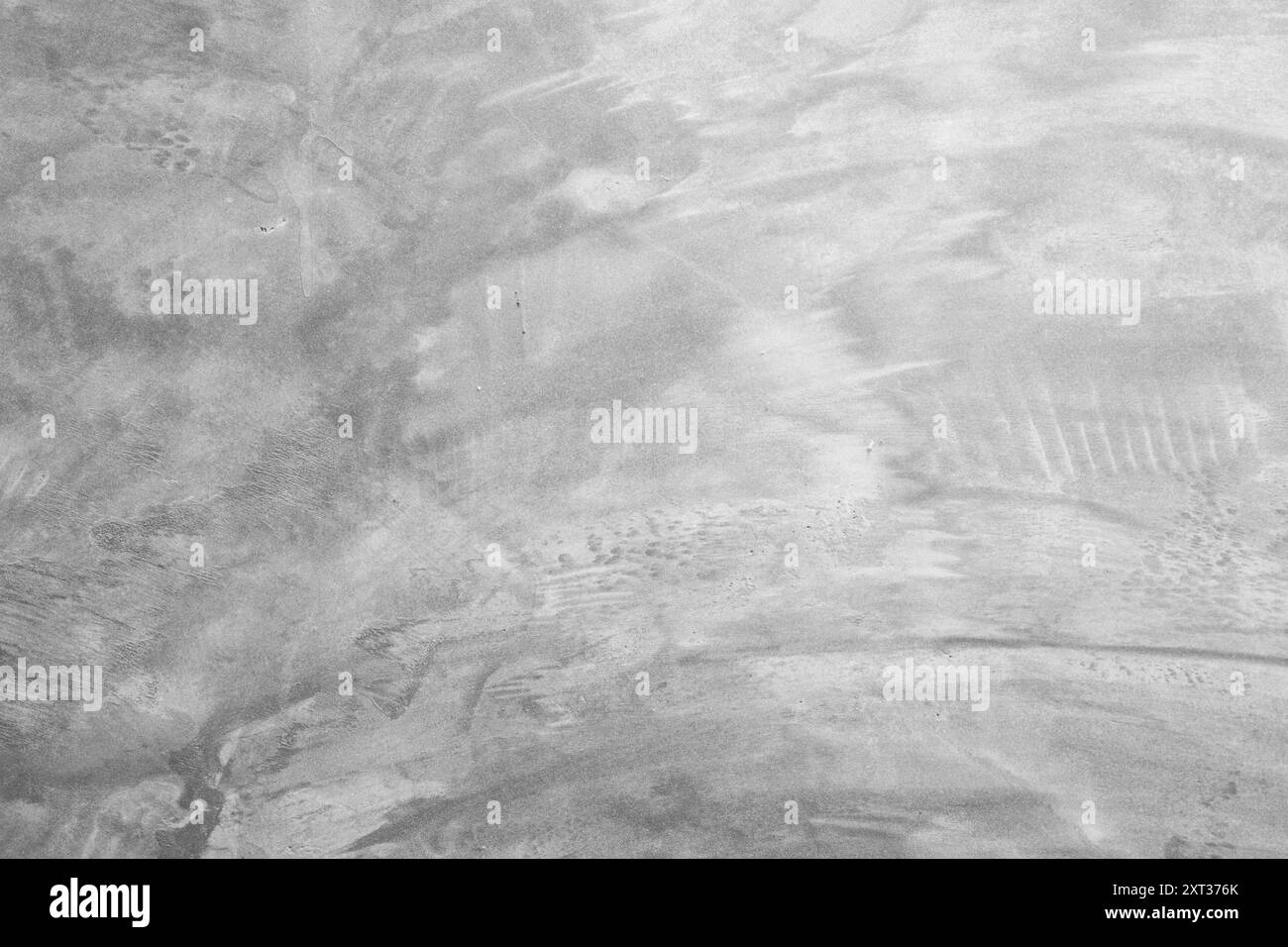 concrete wall with a raw, unfinished look showcases the rough texture ...