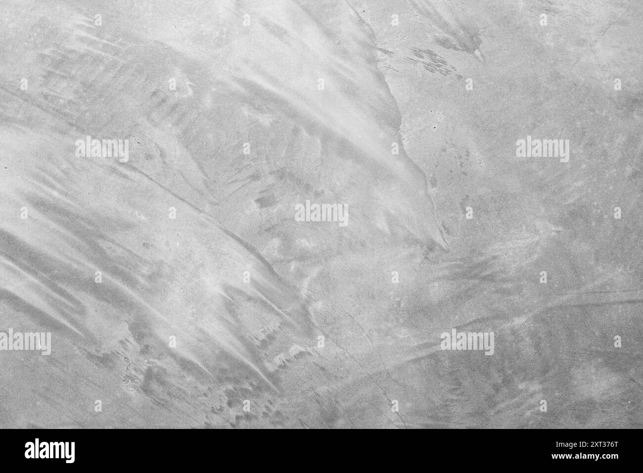 concrete wall with a raw, unfinished look showcases the rough texture ...