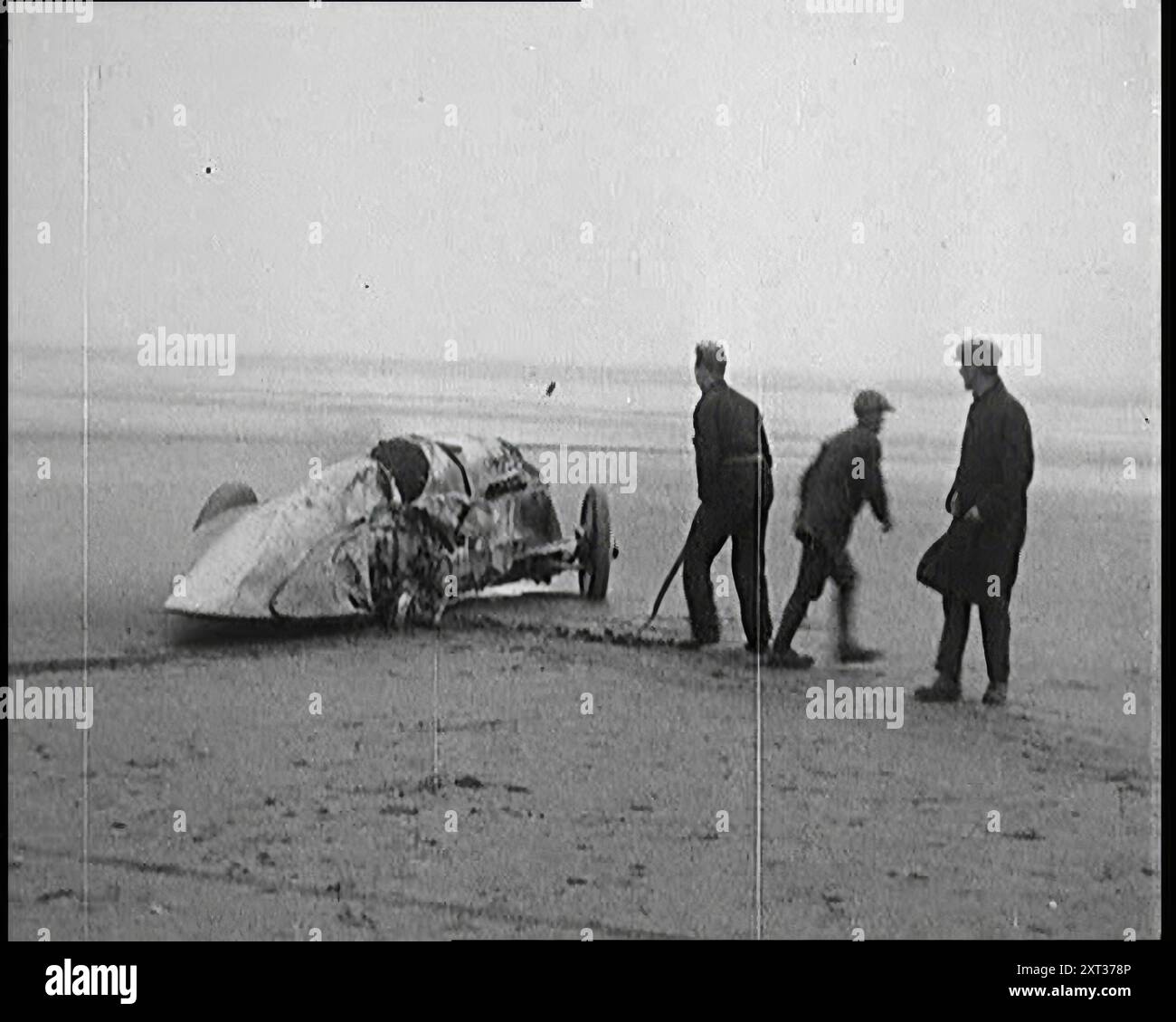 Civilians Attending the Wreckage of a Speed Car, 1927. The wreckage of ...