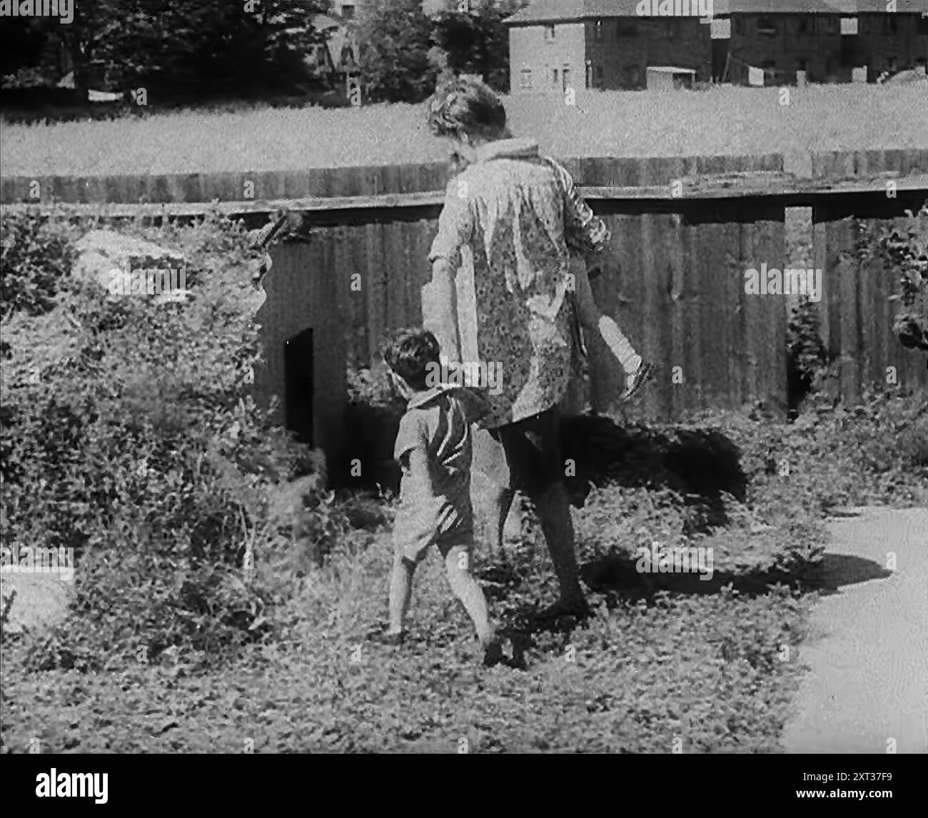 Woman Leading Her Children to an Air Raid Shelter, 1940. Britain during ...