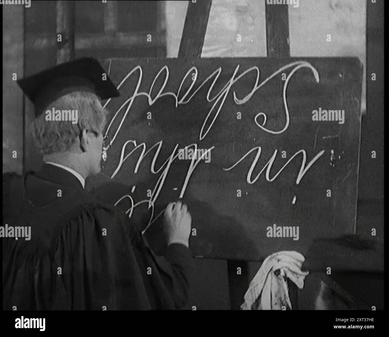 The Entertainer Will Hay Wearing a Headmaster's Cap and Gown Writing ...