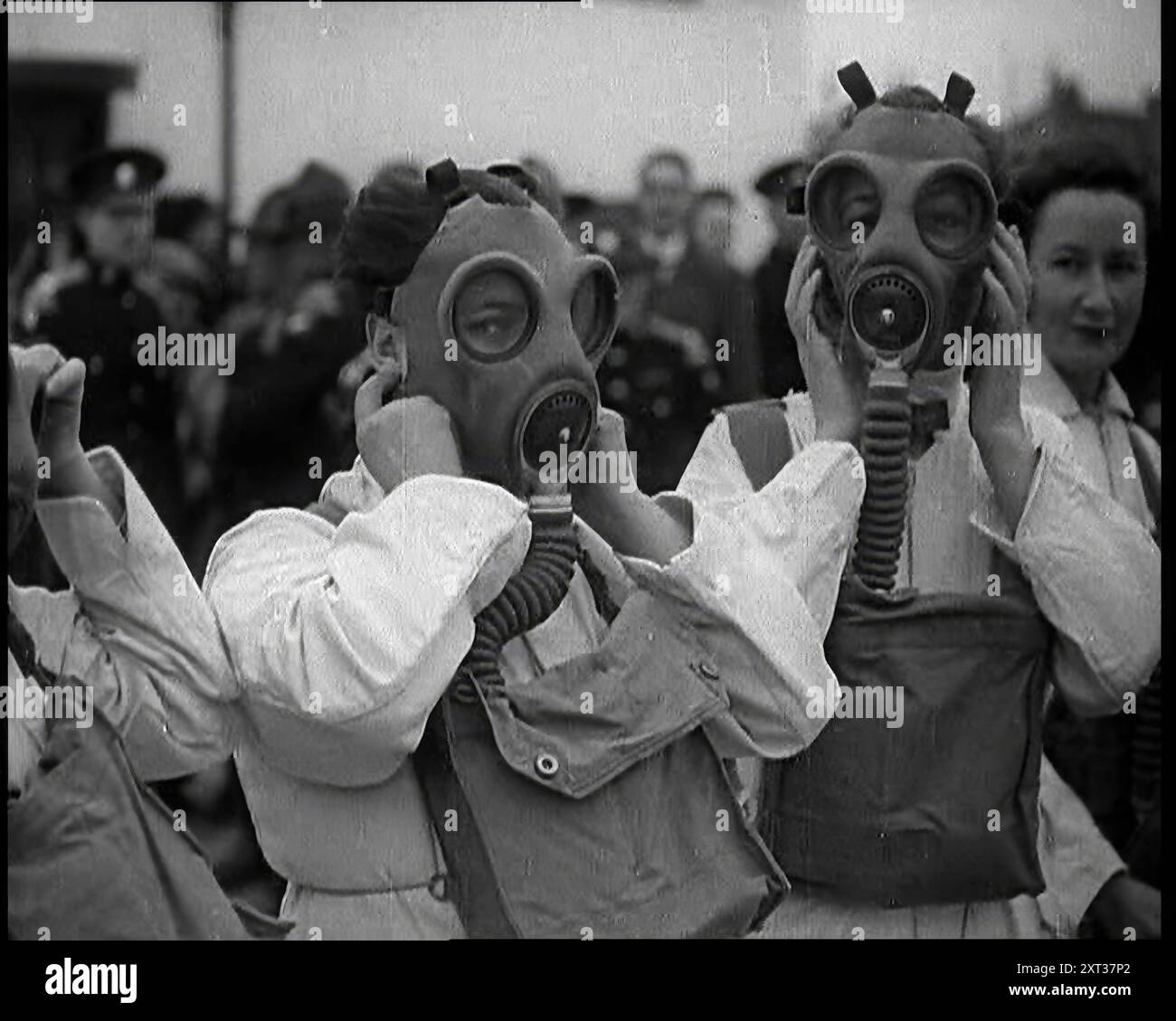 A Close up of Three Female Civil Defence Volunteers in White Boiler ...