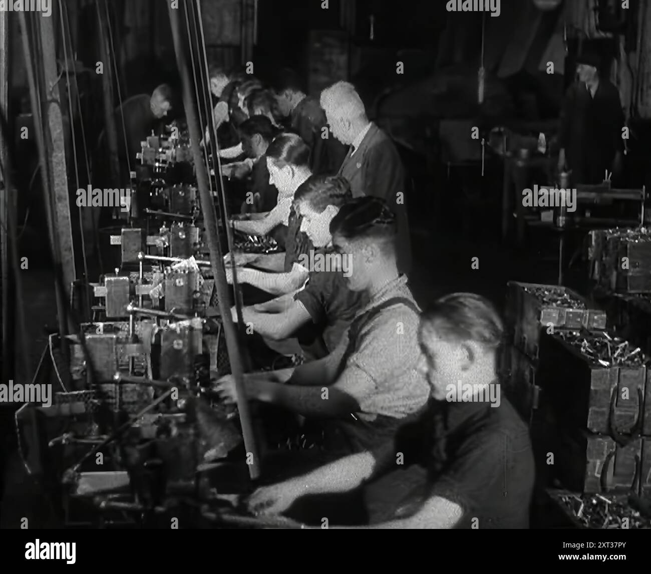 British Workers in a Factory, 1941. Second World War. As well as ...