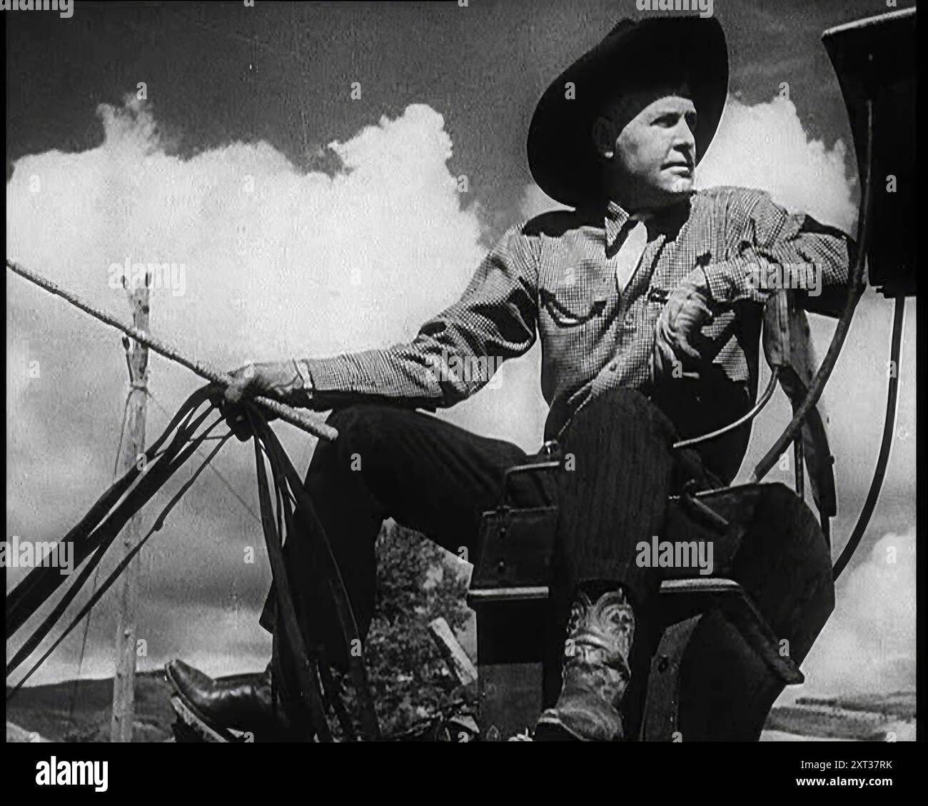 Male Civilian With a Cowboy Hat Sitting On a Coach Waiting For ...