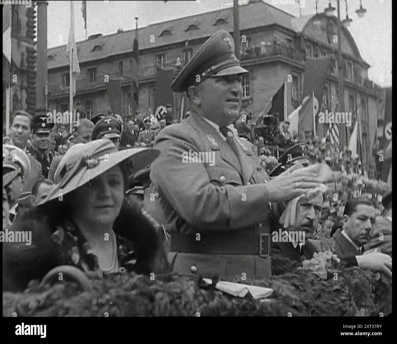 Close up of a German Nazi Party Official in a VIP Section of a Stand ...